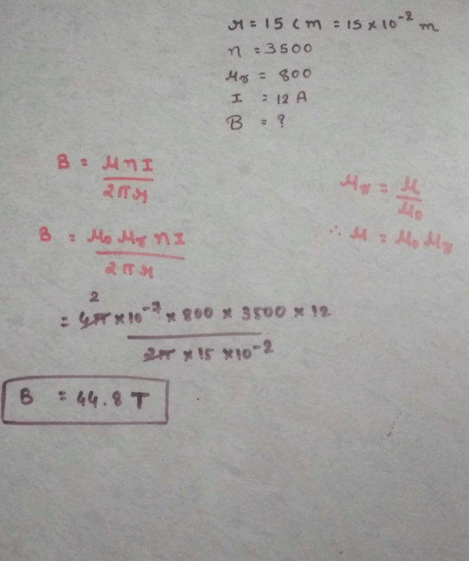 A Rowland ring of mean radius 15 cm has 3500 turns of wire wound on a ...